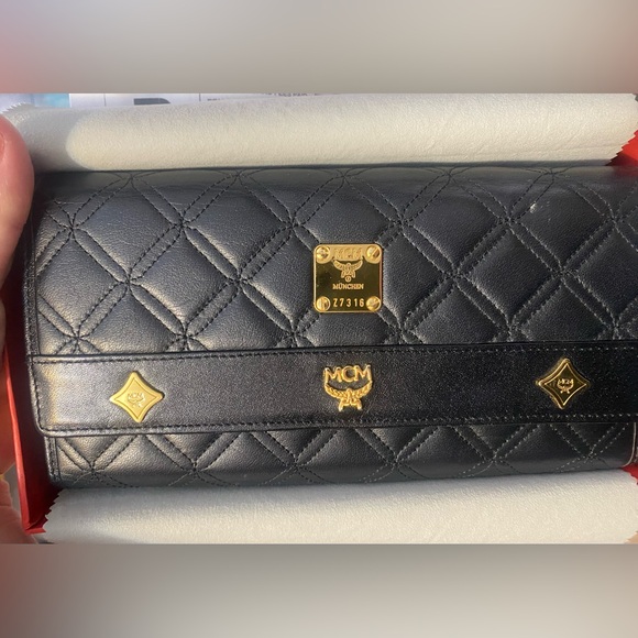 MCM | Bags | Mcm Black Leather Wallet Euc Comes With Box Full Inclusion ...